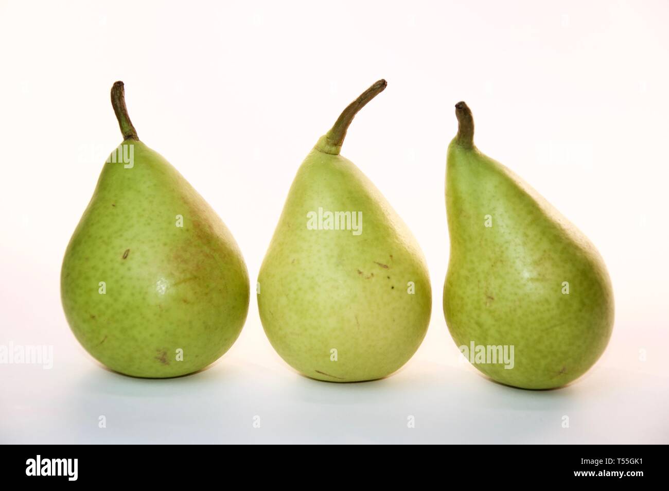 Three pears isolated in white bacground Stock Photo - Alamy