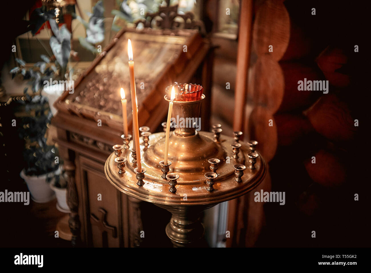 lighting fire candles in russian orthodox church Stock Photo - Alamy