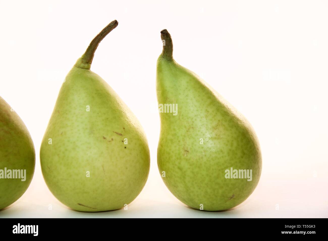 Three pears isolated in white bacground Stock Photo - Alamy