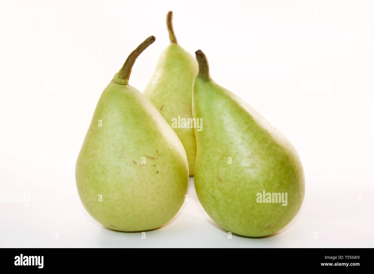 Three pears isolated in white bacground Stock Photo - Alamy
