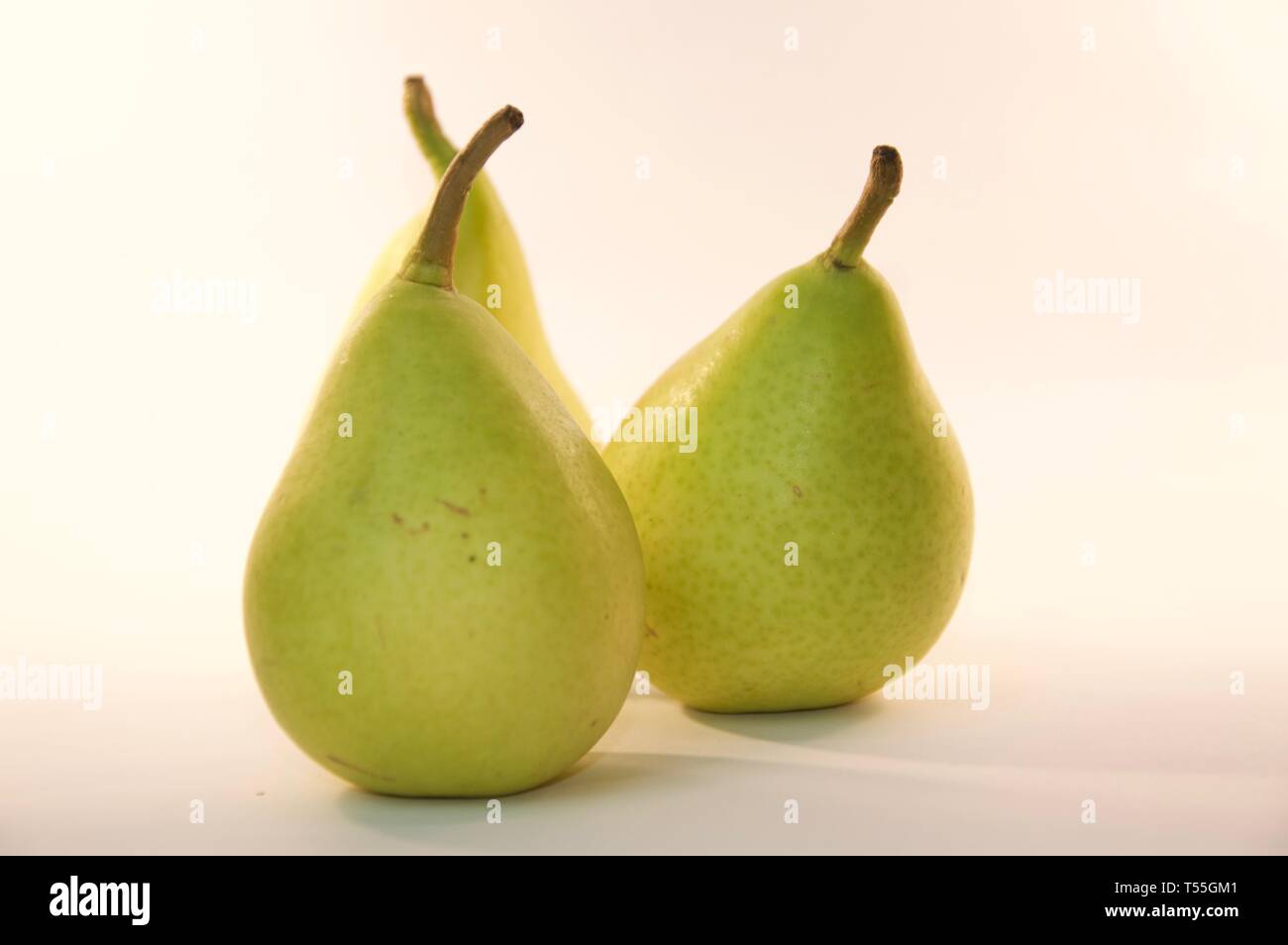 Three pears isolated in white bacground Stock Photo - Alamy