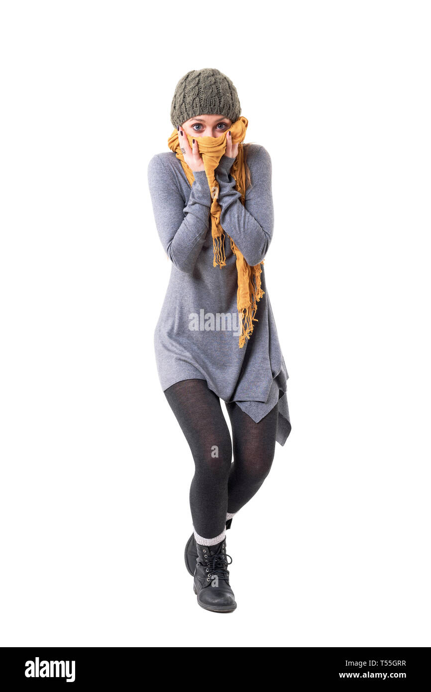 Childish playful young stylish cool woman hiding while holding scarf ...