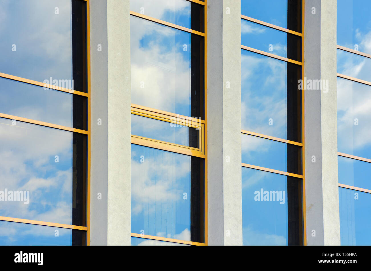 beautiful urban architecture background. window reflection of a clouds ...
