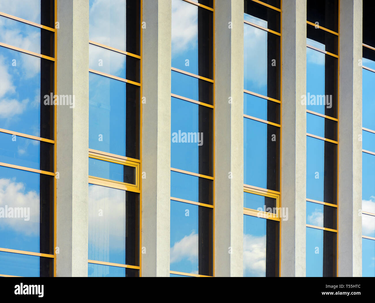 beautiful urban architecture background. window reflection of a clouds ...