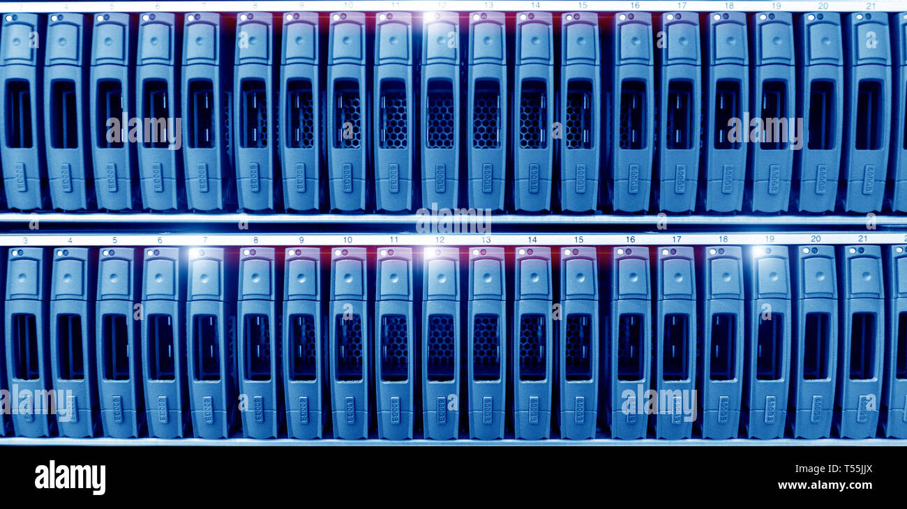Server hard drives SATA in the data center server room. Disk storage array Stock Photo - Alamy