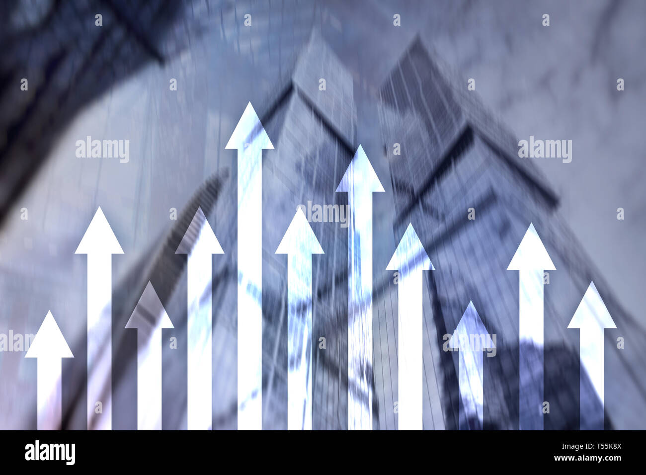 Up arrow graph on skyscraper background. Invesment and financial growth ...