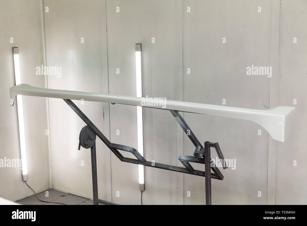 Painting and drying in a professional box of car body parts after ...