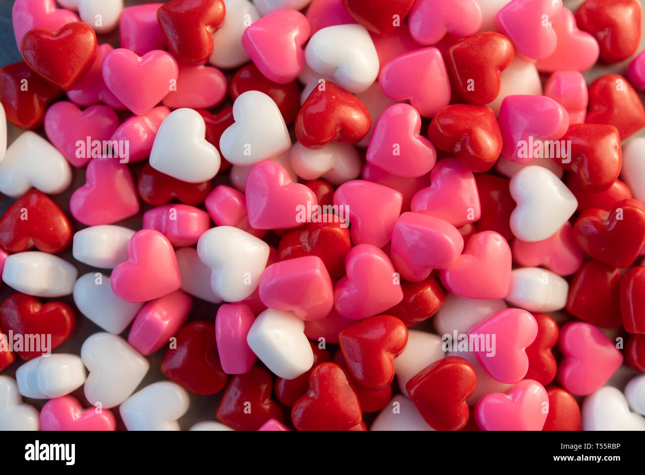 Pile of heart shaped candy Stock Photo - Alamy