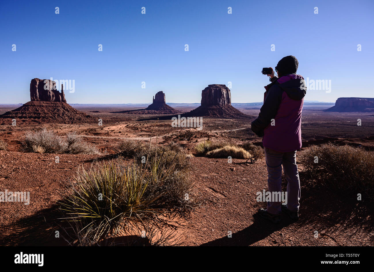 Woman photographing Monument Valley in Arizona, USA Stock Photo - Alamy