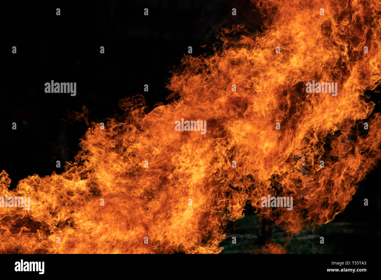 Closeup Fire flames from gas explosion on black background Stock Photo ...