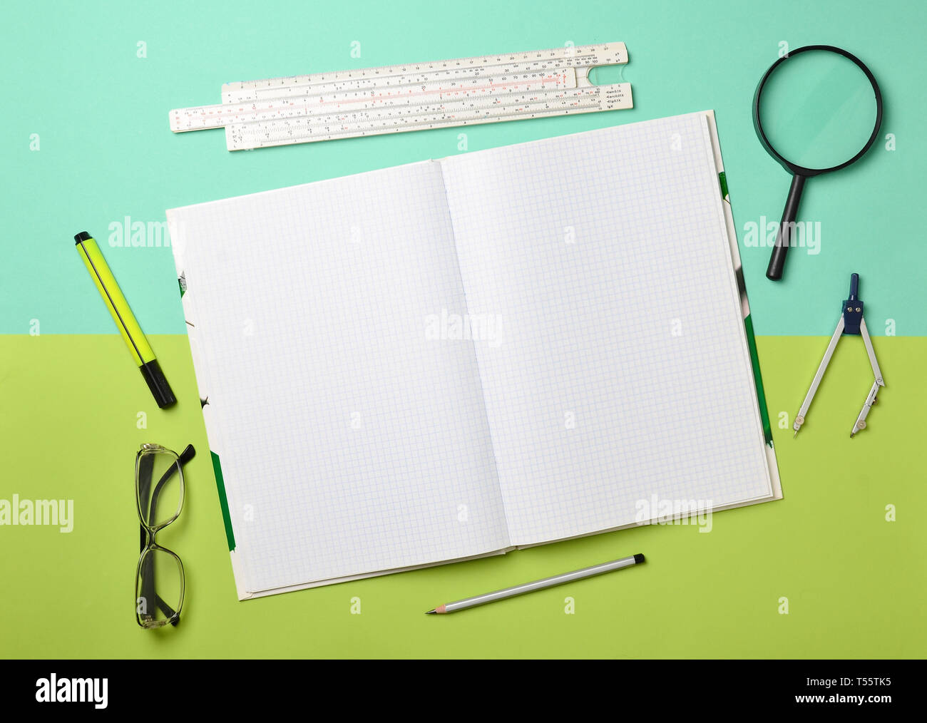 A large notebook for notes and drafting with stationery objects for a ...