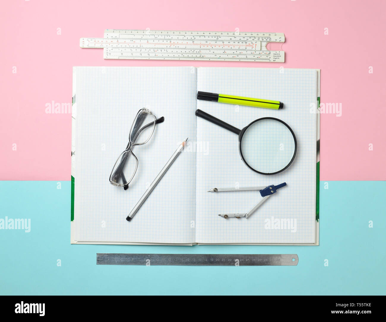 A large notebook for notes and drafting with stationery objects for a ...