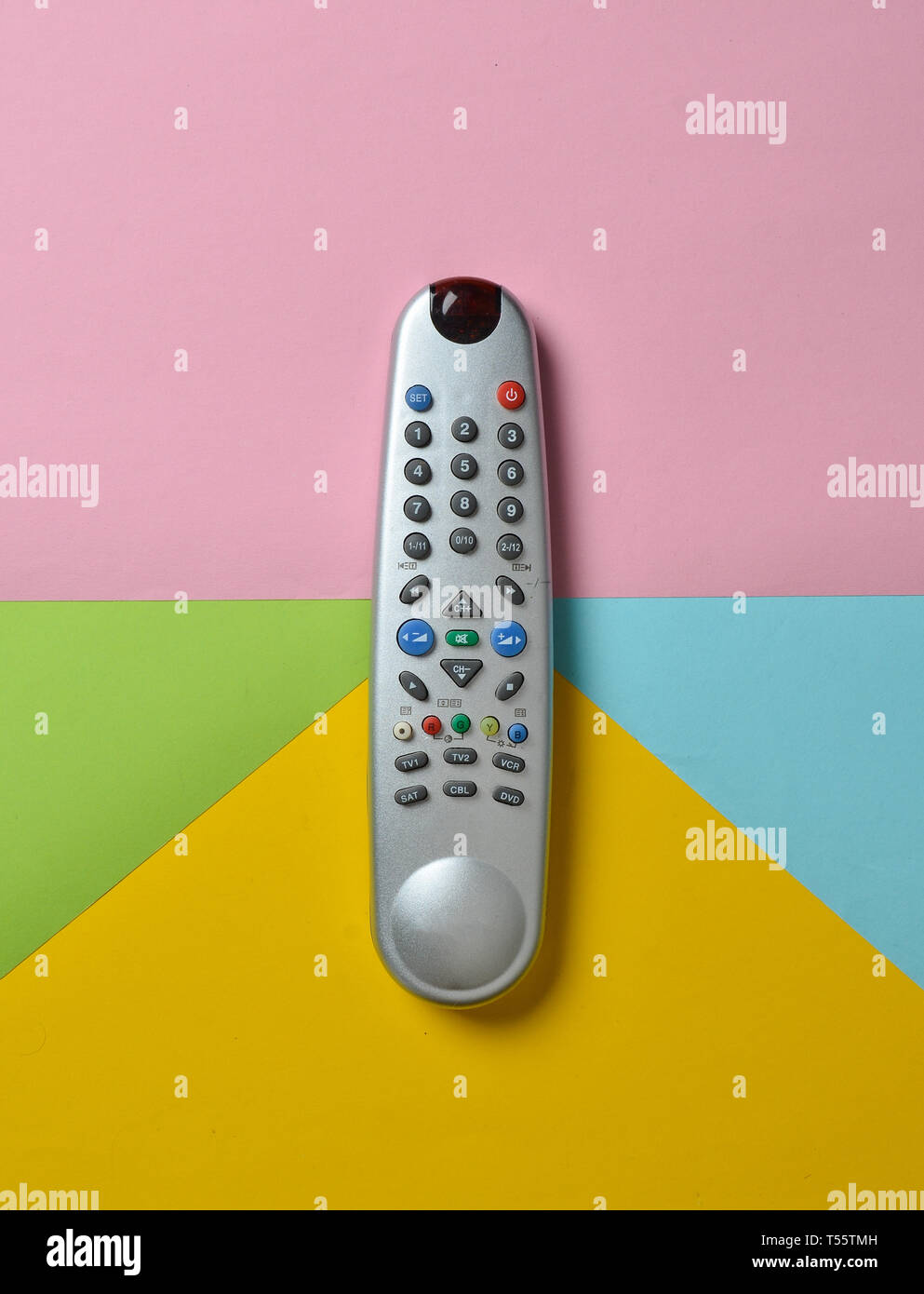 TV remote control on a multi-colored pastel background Stock Photo - Alamy