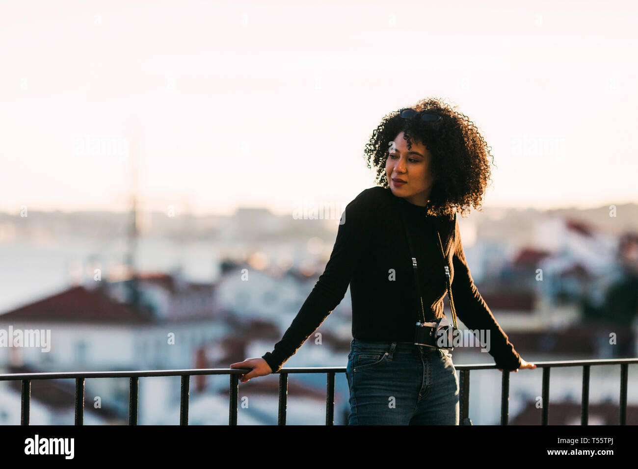Woman railings looking camera hi-res stock photography and images - Alamy