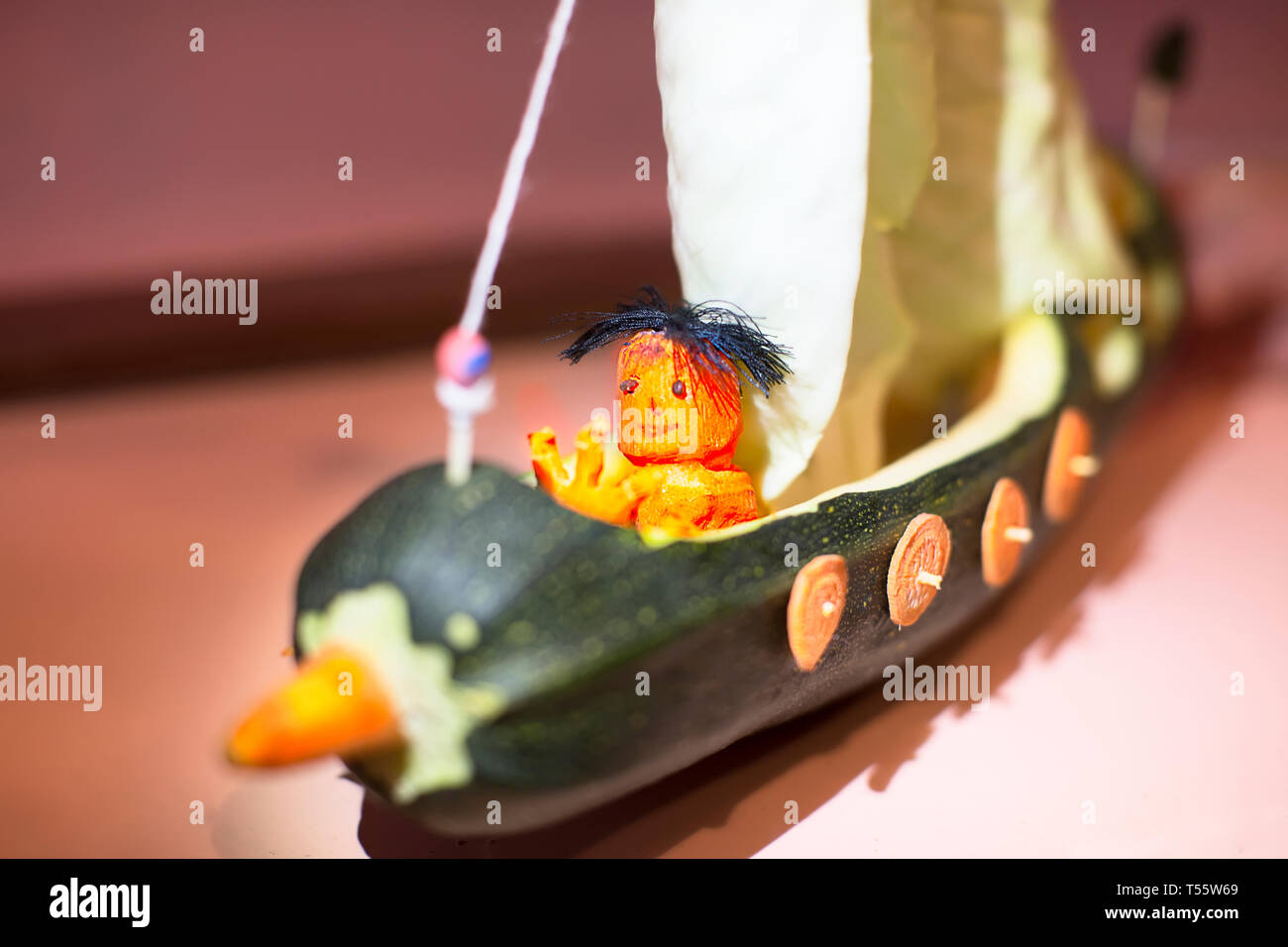 A ship and a sailor made of squash and carrots Stock Photo - Alamy