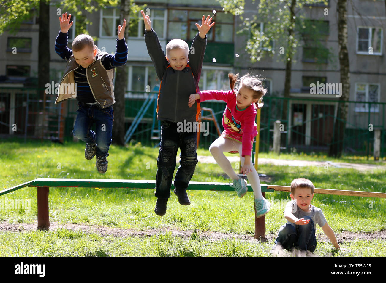 The fifth kindergarten. Walking. Children are jumping up Stock Photo ...