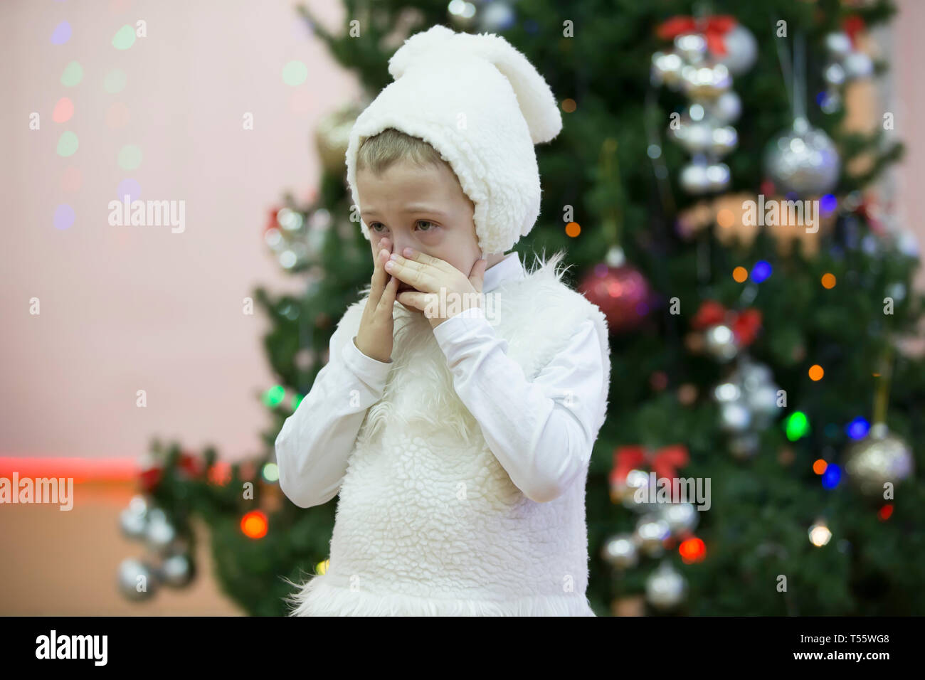 Child crying christmas tree hi-res stock photography and images - Alamy