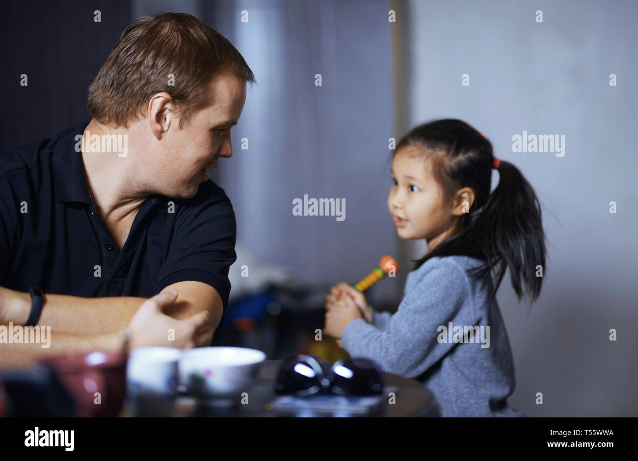 Father with his adopted daughter Stock Photo - Alamy