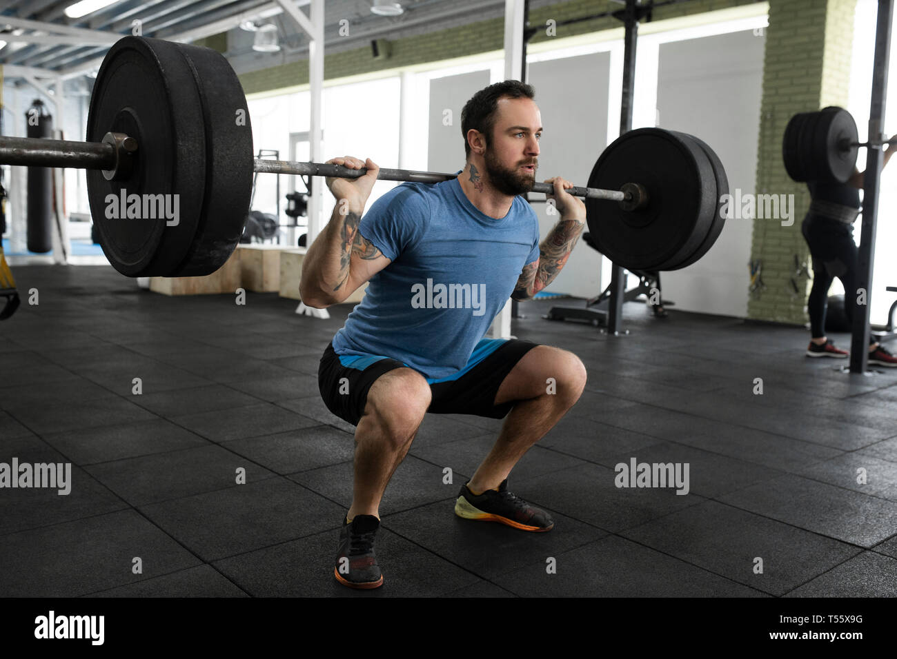 Adult squatting hi-res stock photography and images - Alamy