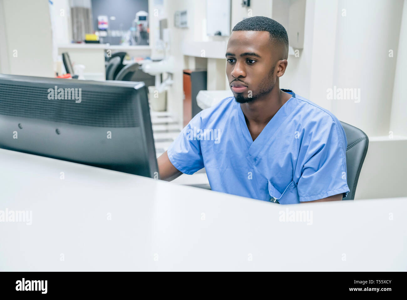 Nurse using computer in hospital Stock Photo - Alamy