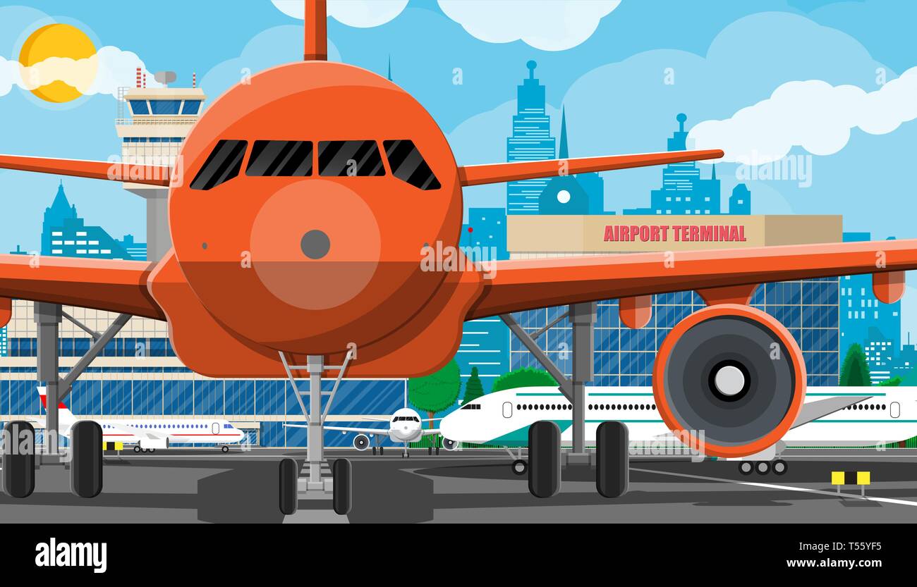 Plane before takeoff. Airport control tower, jetway, terminal building ...