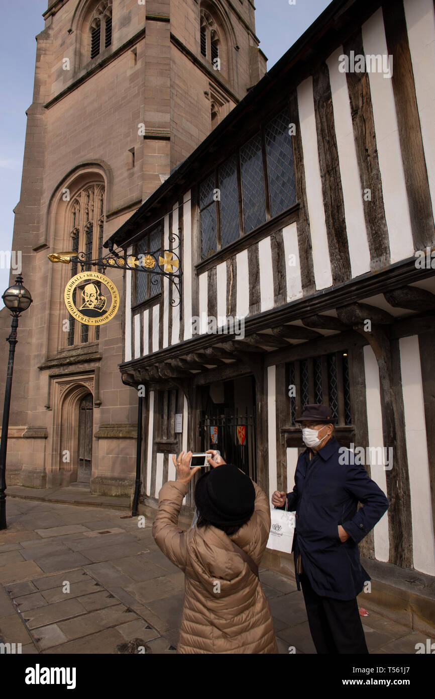 Tourists taking a photo underneath a William Shakespeare sign at the ...