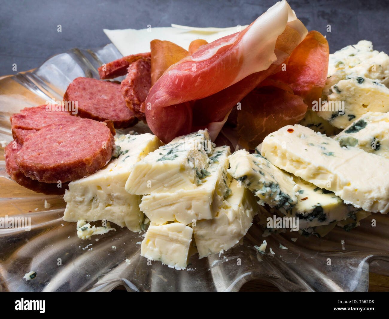 Antipasto Platter cold, Cheese and salami platter on concrete background Stock Photo - Alamy