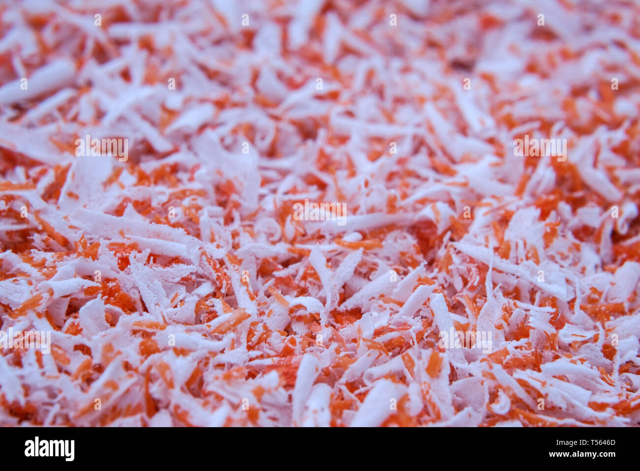 orange Plastic colored granulated crumb at the plant for processing and ...