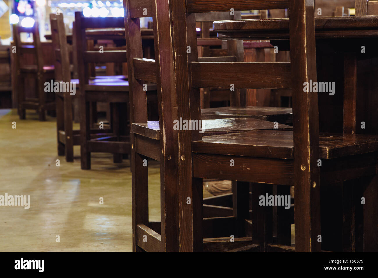 wooden chairs in vintage style in a beer pub or in a restaurant. space ...