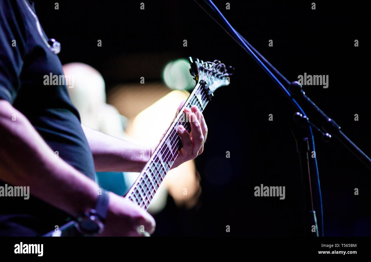 guitarist on stage during concert Stock Photo - Alamy
