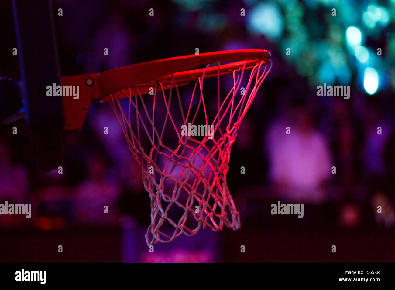 basketball hoop in red neon lights game day Stock Photo - Alamy