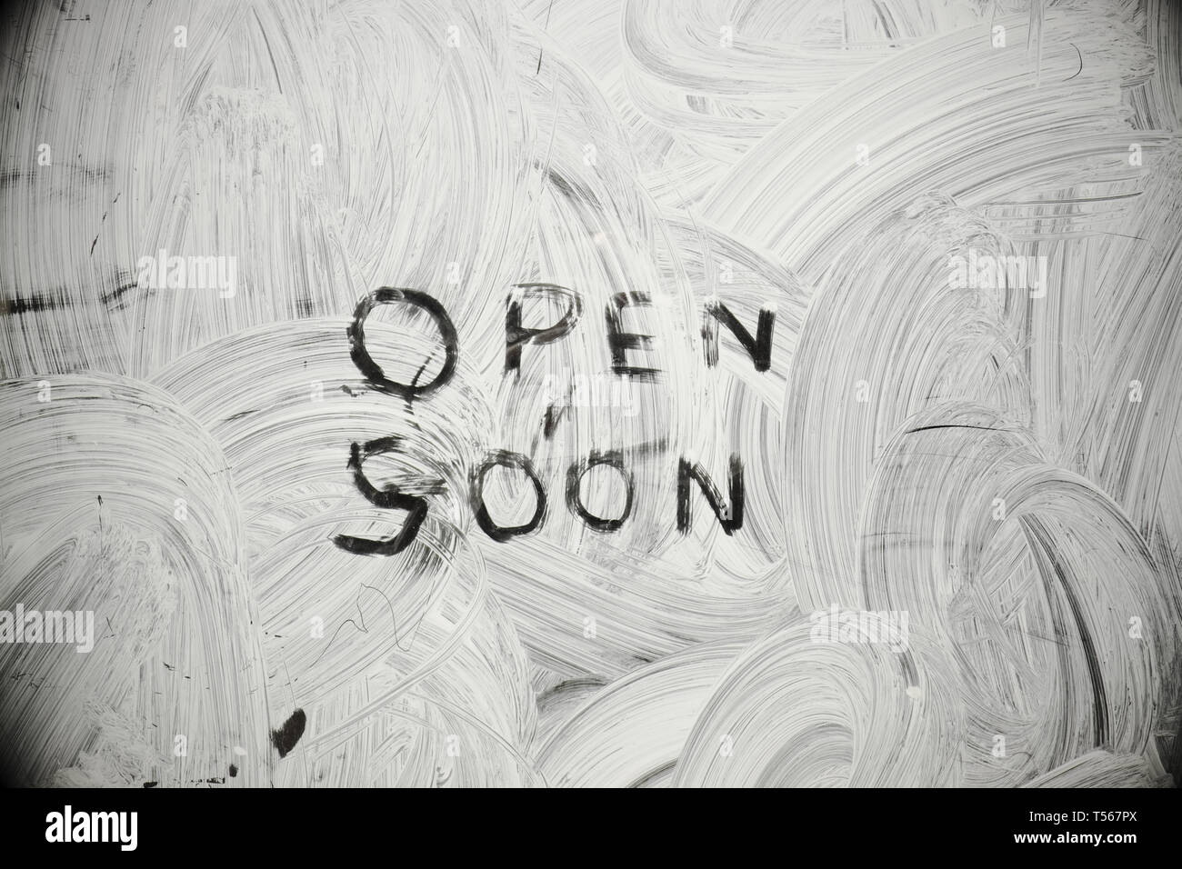 Open Soon written on a shop window as it undergoes redevelopment before ...