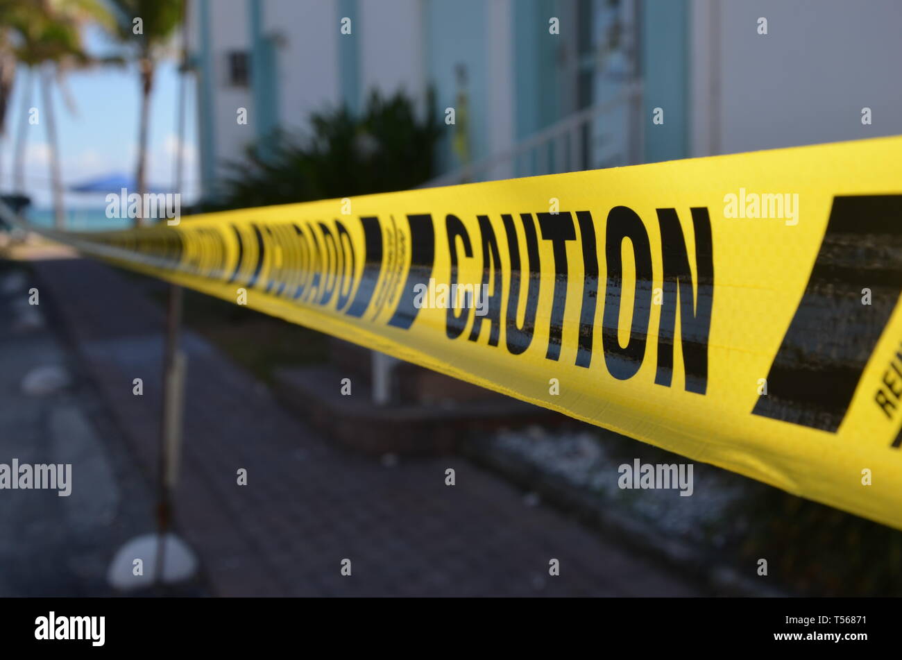 Caution yellow line Stock Photo - Alamy