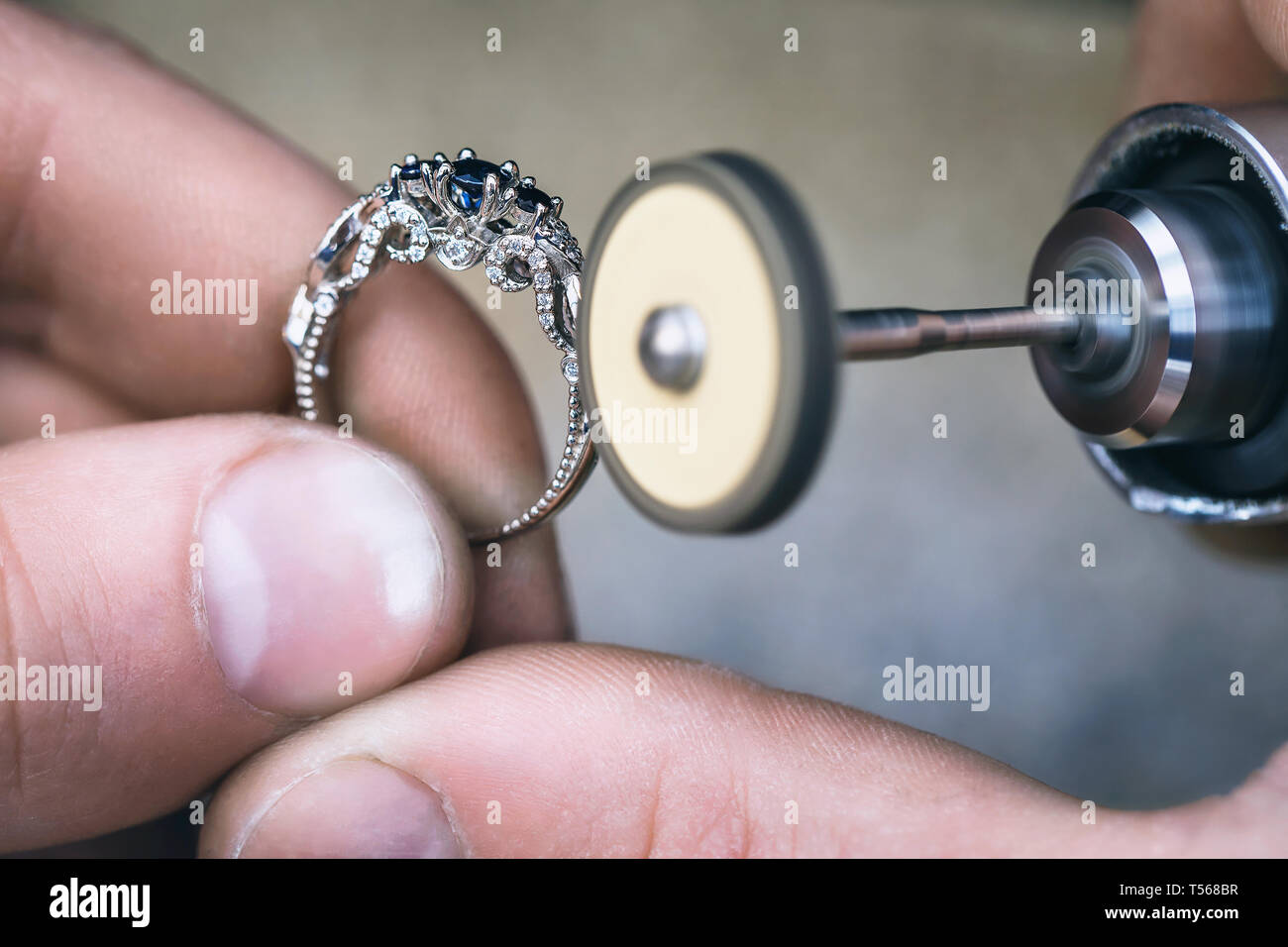 Polishing of the Golden Ring in a jewelry workshop. Working process ...