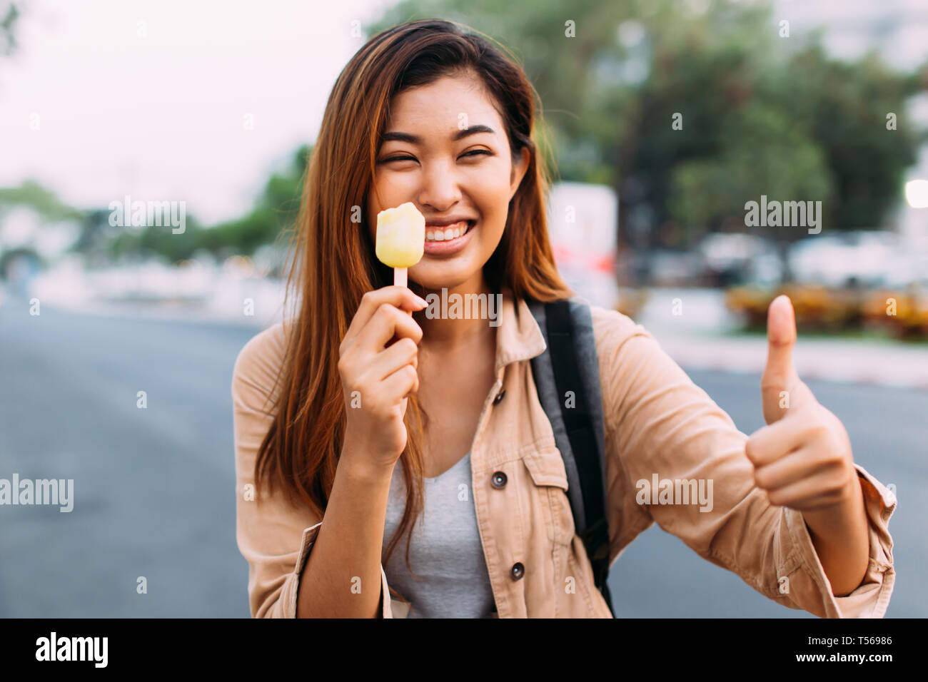 Eating popsicle adult hi-res stock photography and images - Alamy