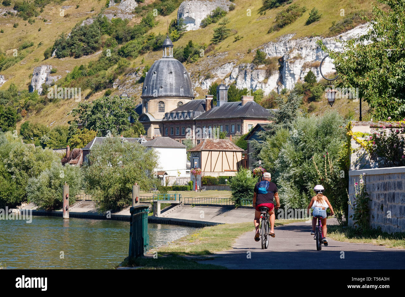 small town, riverside path, bikers, exercise, recreation, old buildings ...