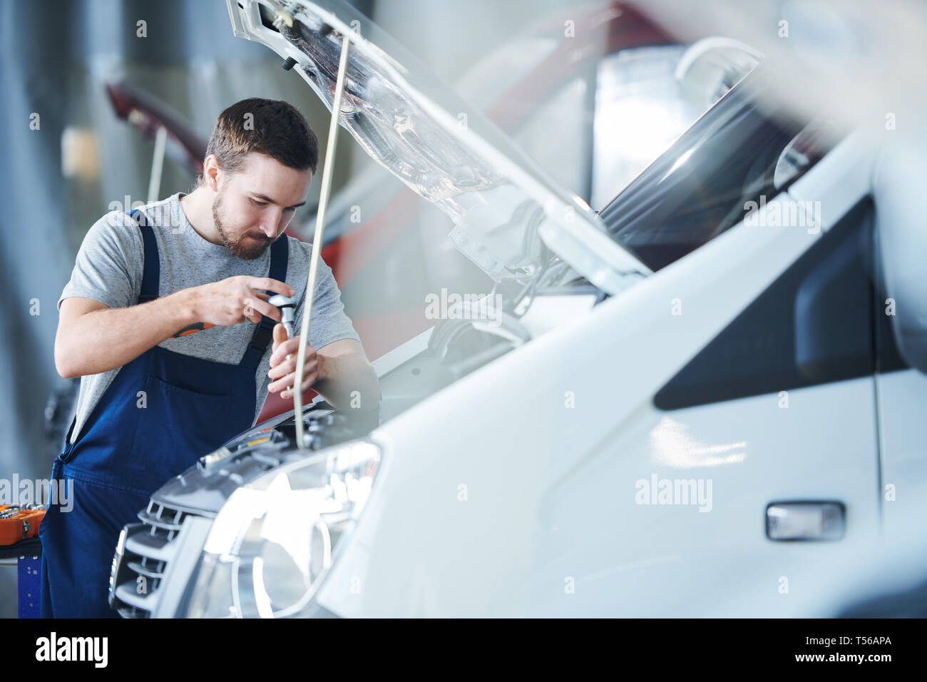 Checking car engine Stock Photo - Alamy