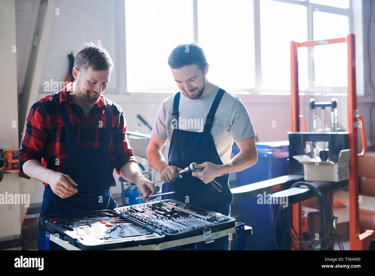 Workers with handtools Stock Photo - Alamy