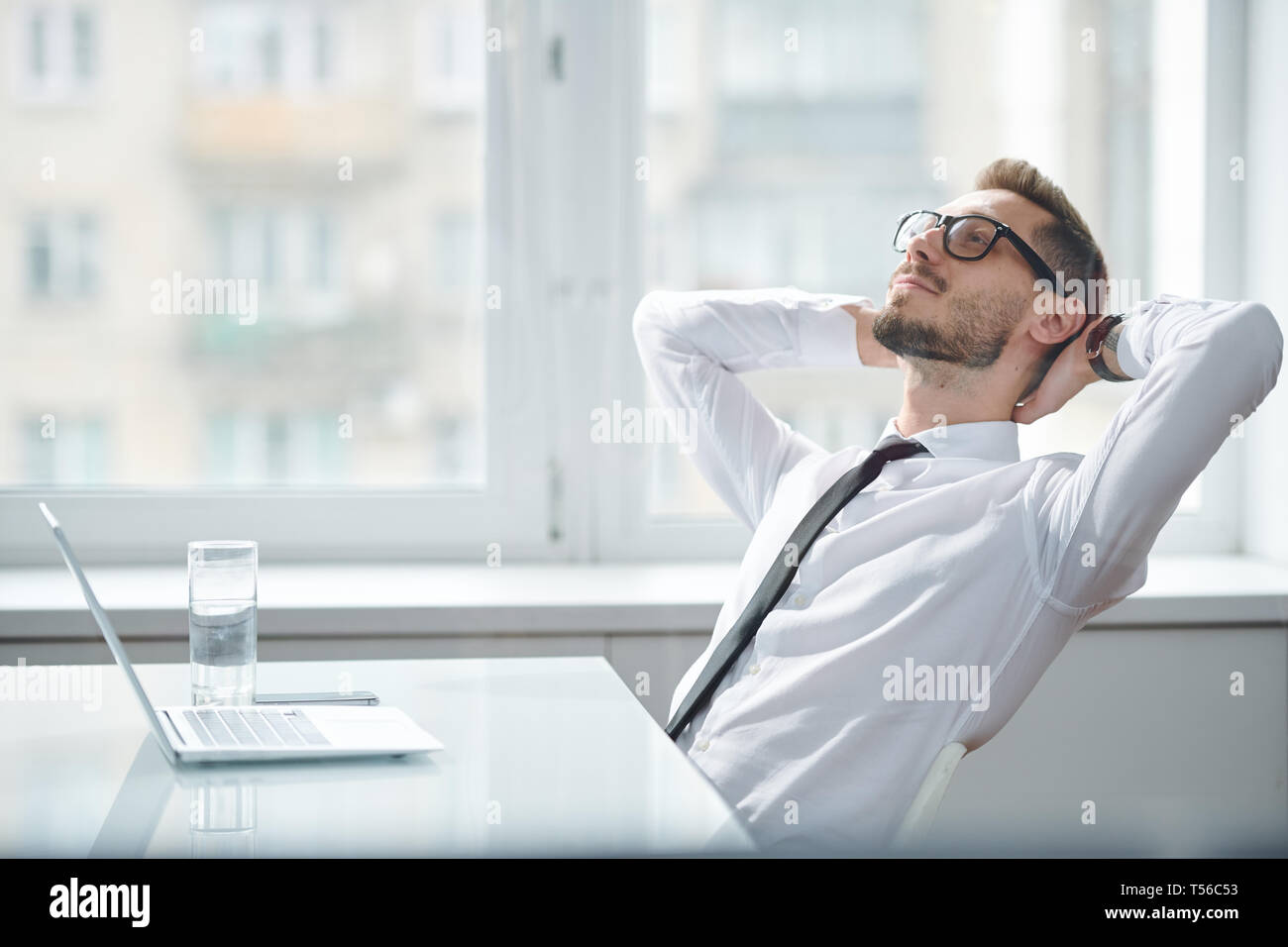 Daydreams in office Stock Photo - Alamy