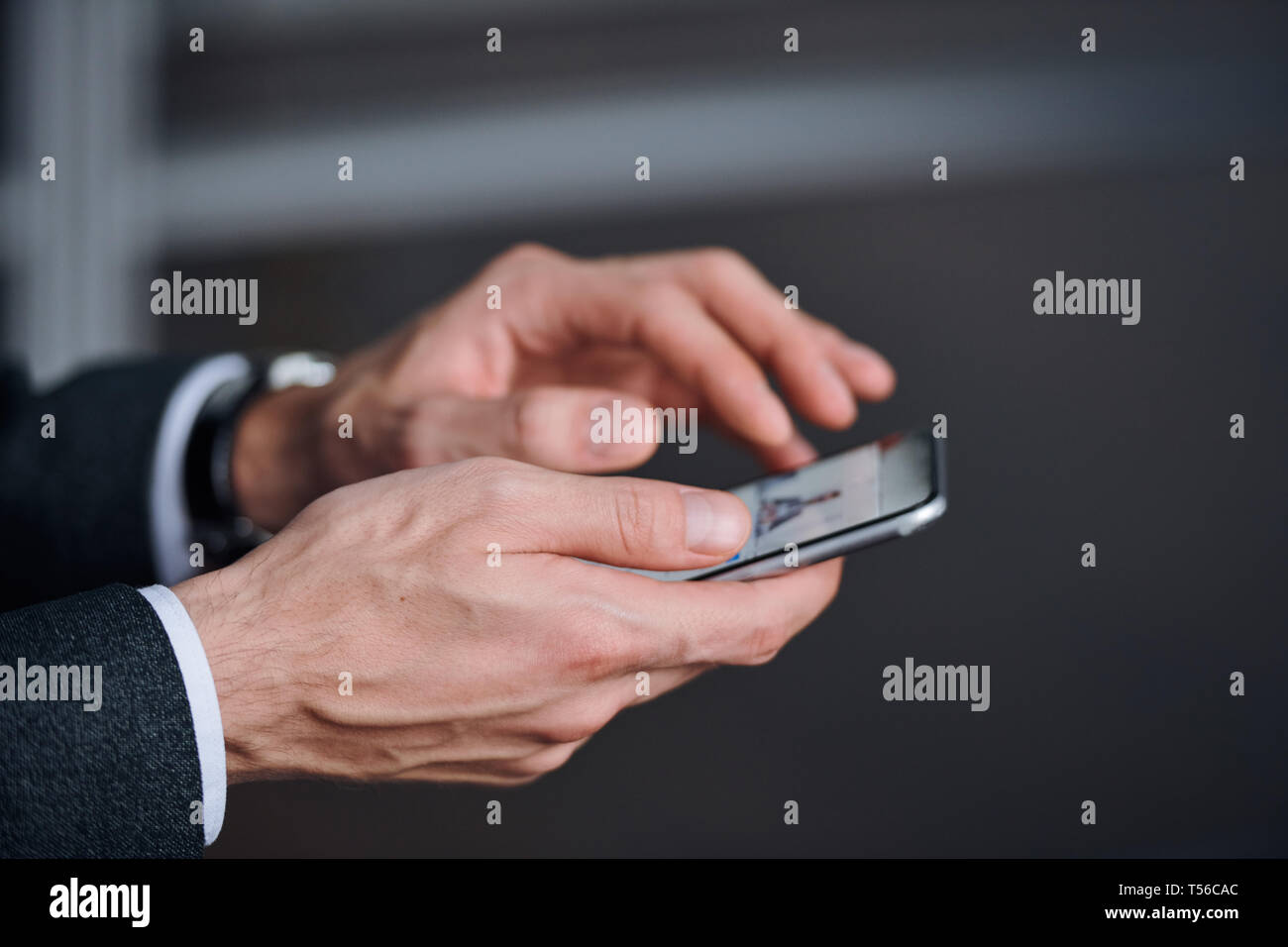 Scrolling through photos in smartphone Stock Photo - Alamy