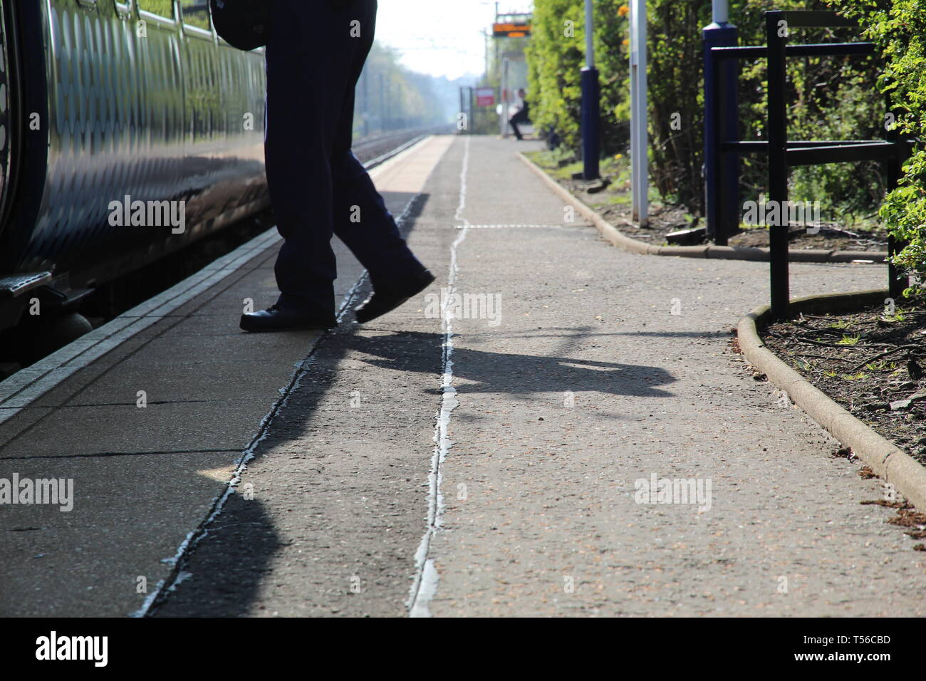 Male passenger boarding a train hi-res stock photography and images - Alamy