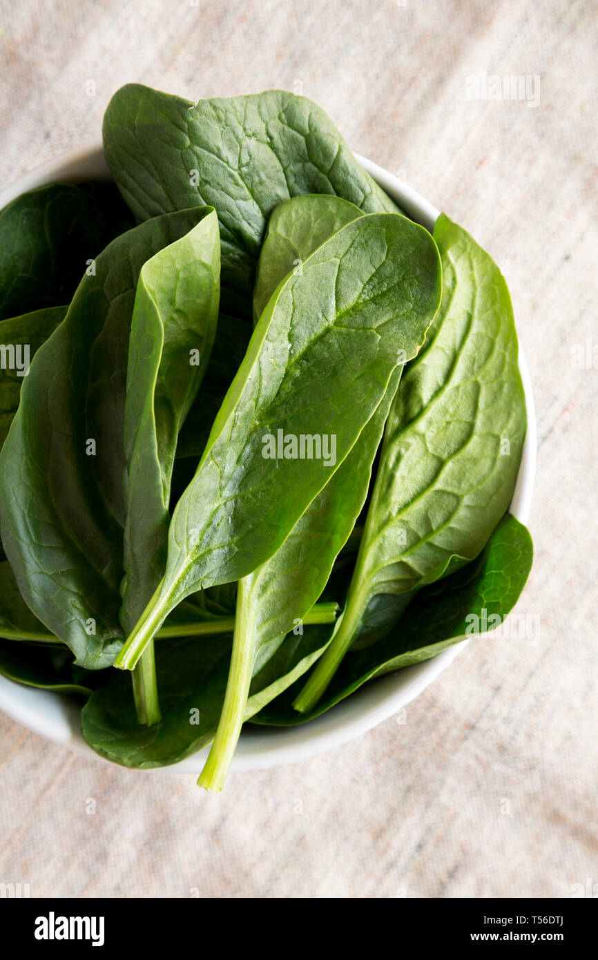 Fresh spinach in a bowl, top view. Overhead, from above. Close-up Stock ...