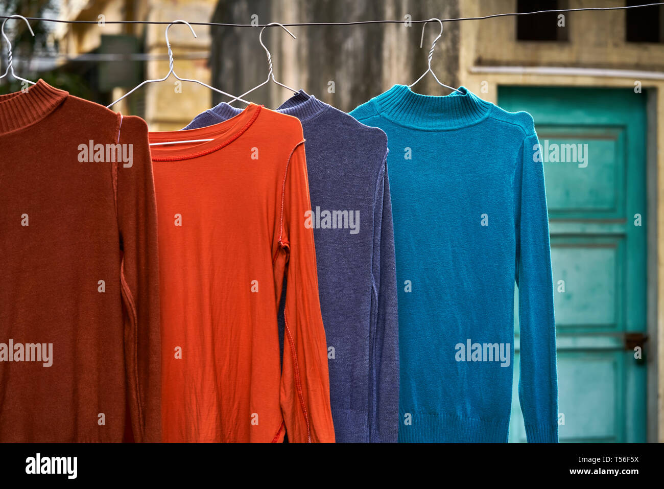 Drying clothes on apartment building hi-res stock photography and ...