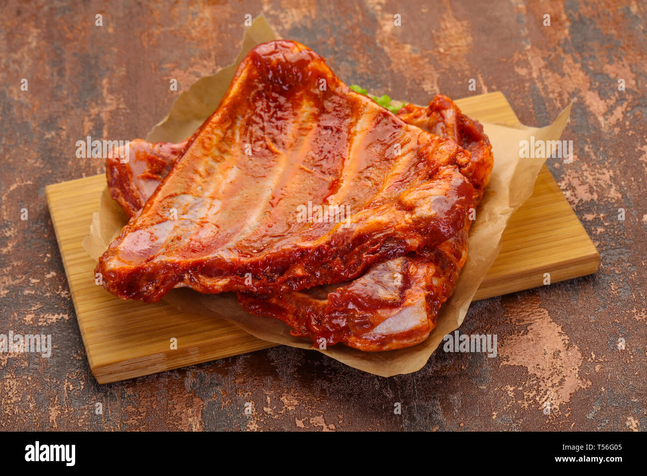 Raw marinated pork ribs ready for cooking Stock Photo - Alamy