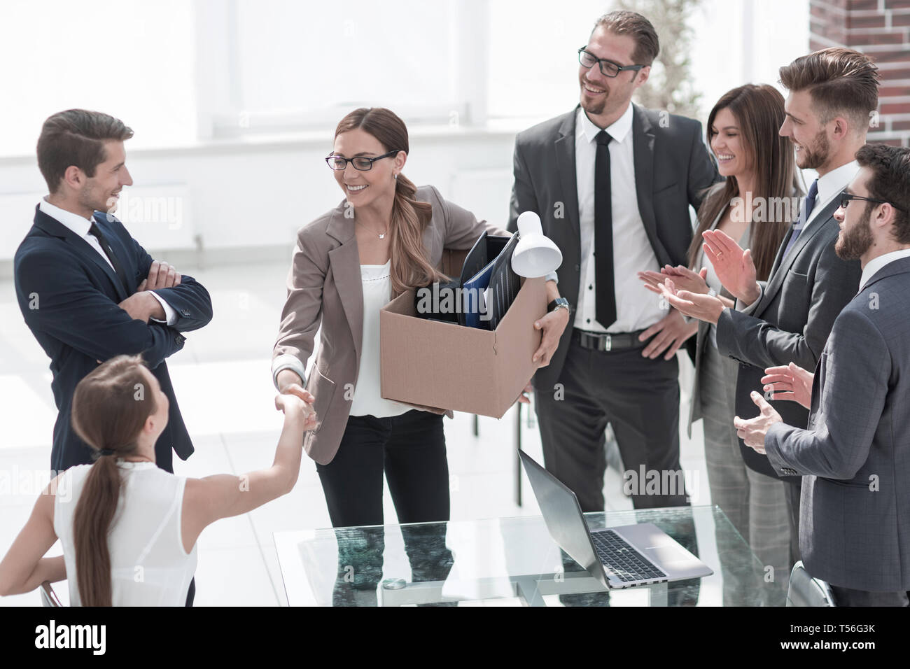 business team meets a new employee.the concept of the first working day ...