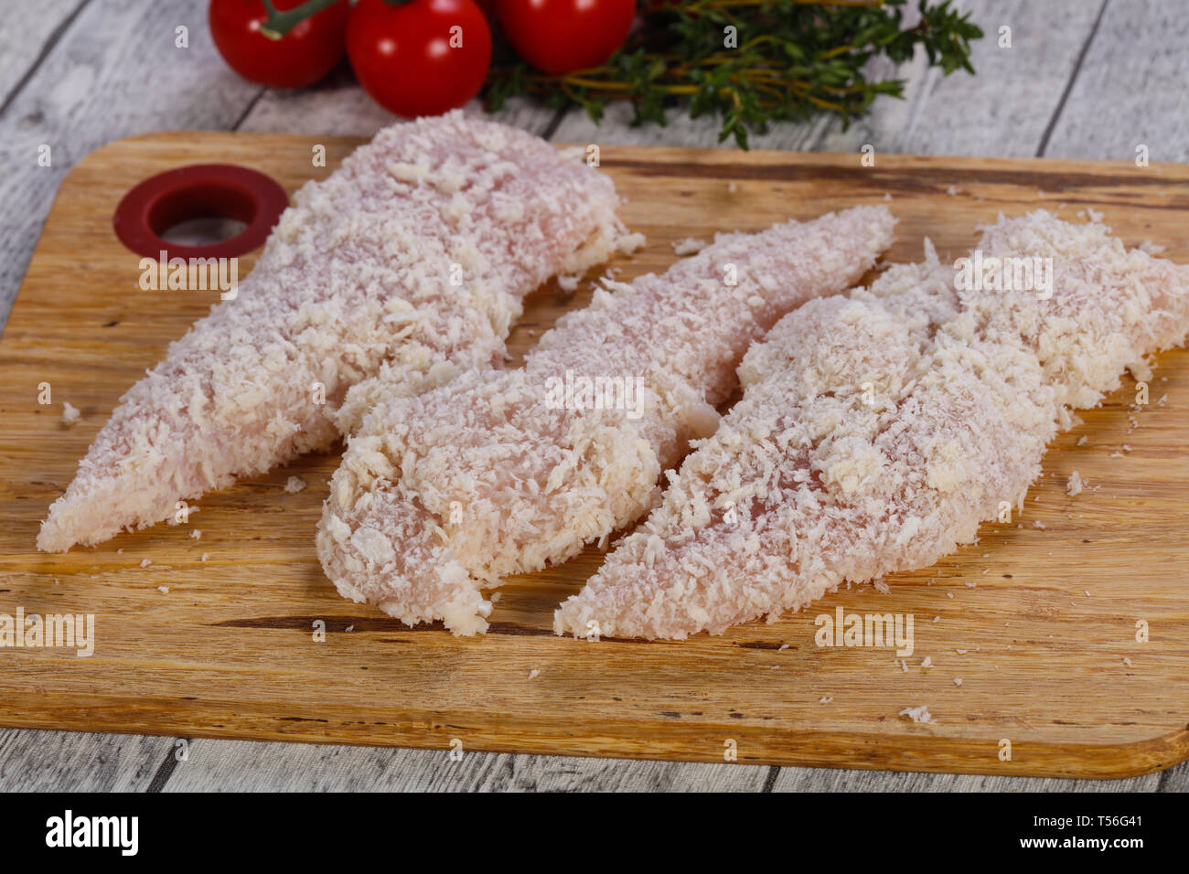 Raw chicken cutlet ready for cooking Stock Photo - Alamy