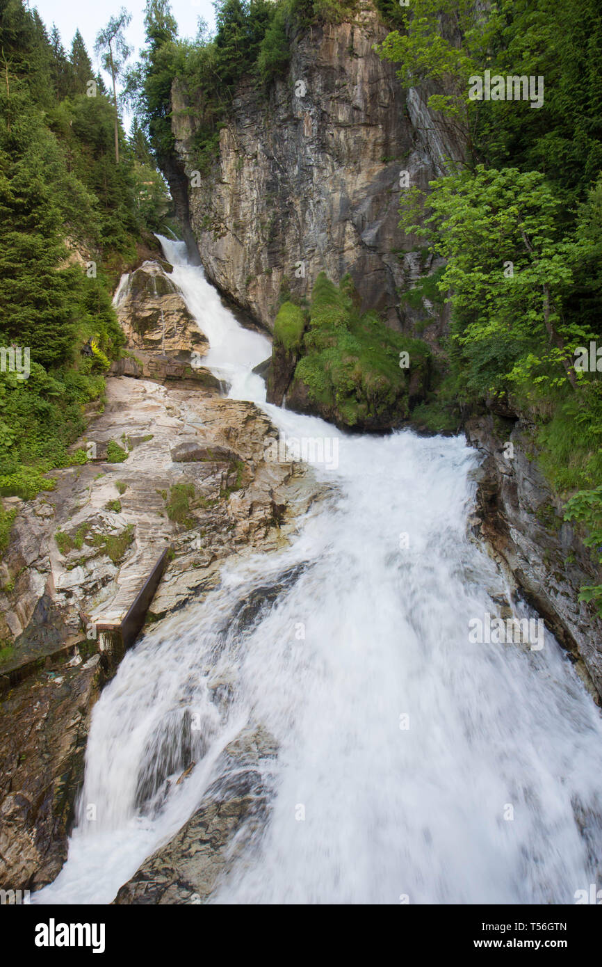waterfall in the beautiful spa town of Bad Gastein , Austrian Alps ...