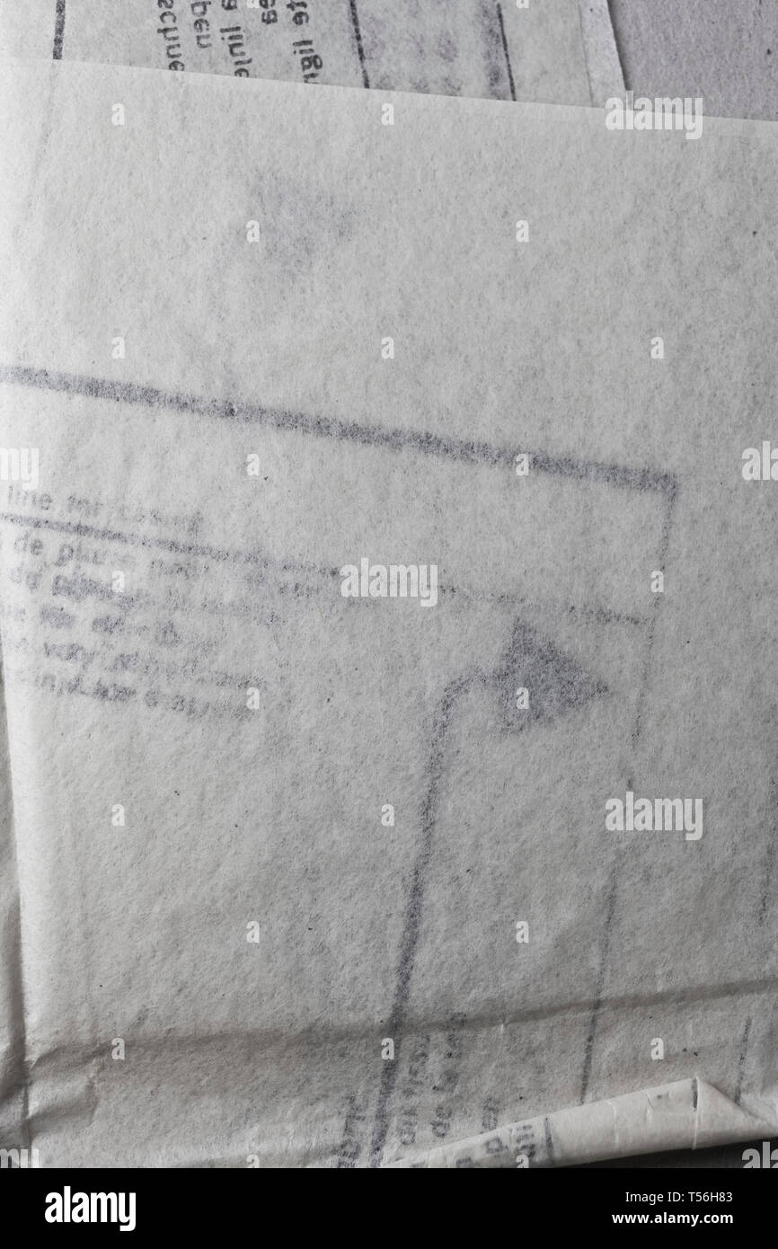 Sewing pattern on thin paper background Stock Photo - Alamy