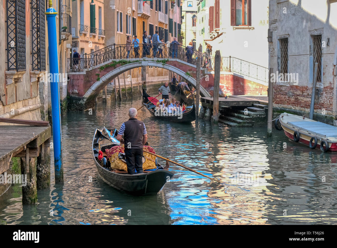 Venice, Italy - April 17 2019: Traditional Venetian Gondola boat with ...