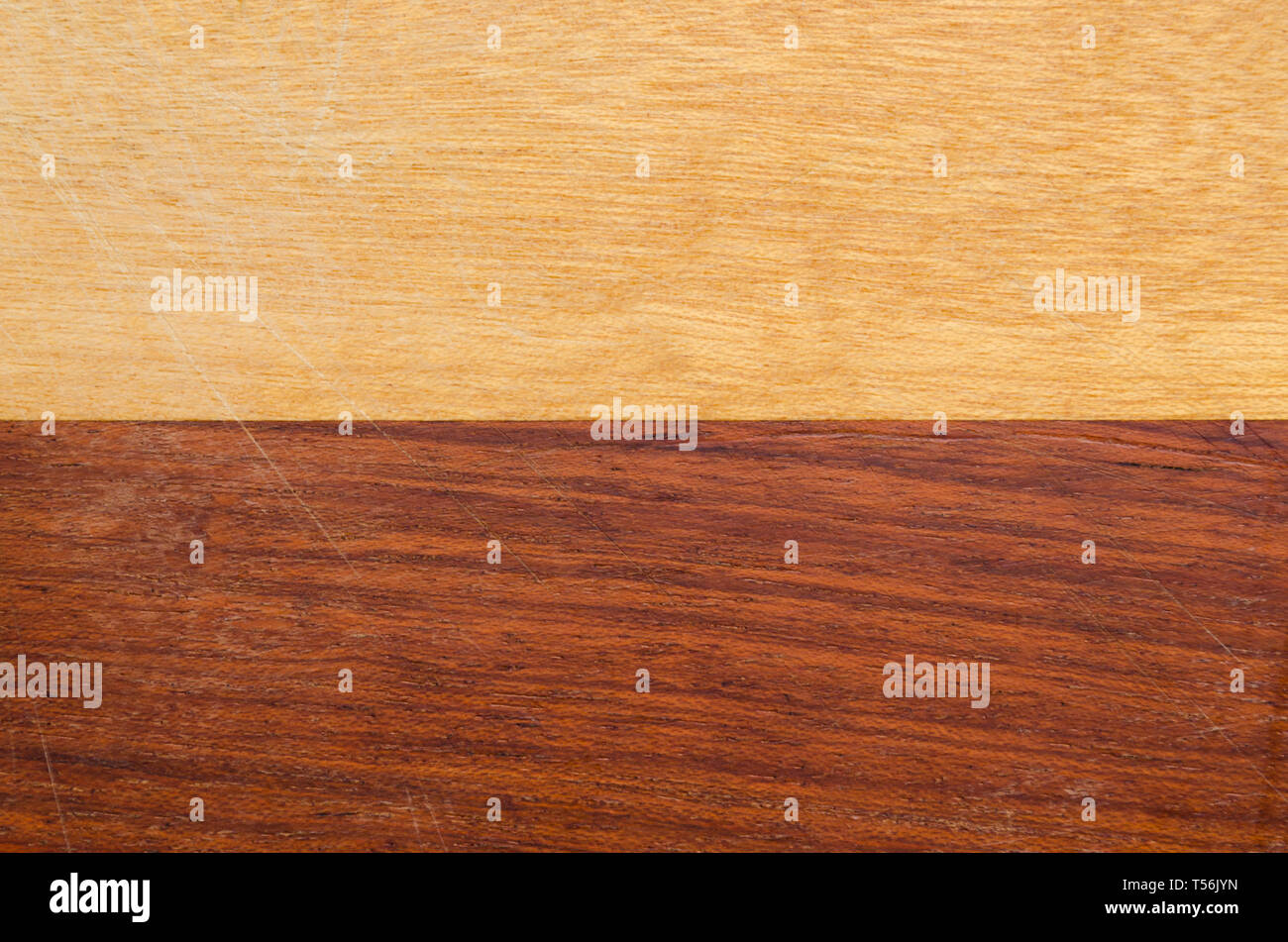 two-colored surface of wood, slightly worn. The colors divide the ...